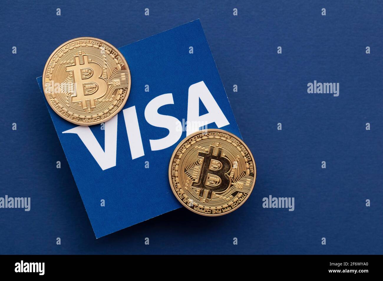 LONDON, UK - March 2021: Bitcoin cryptocurrency on Visa financial ...
