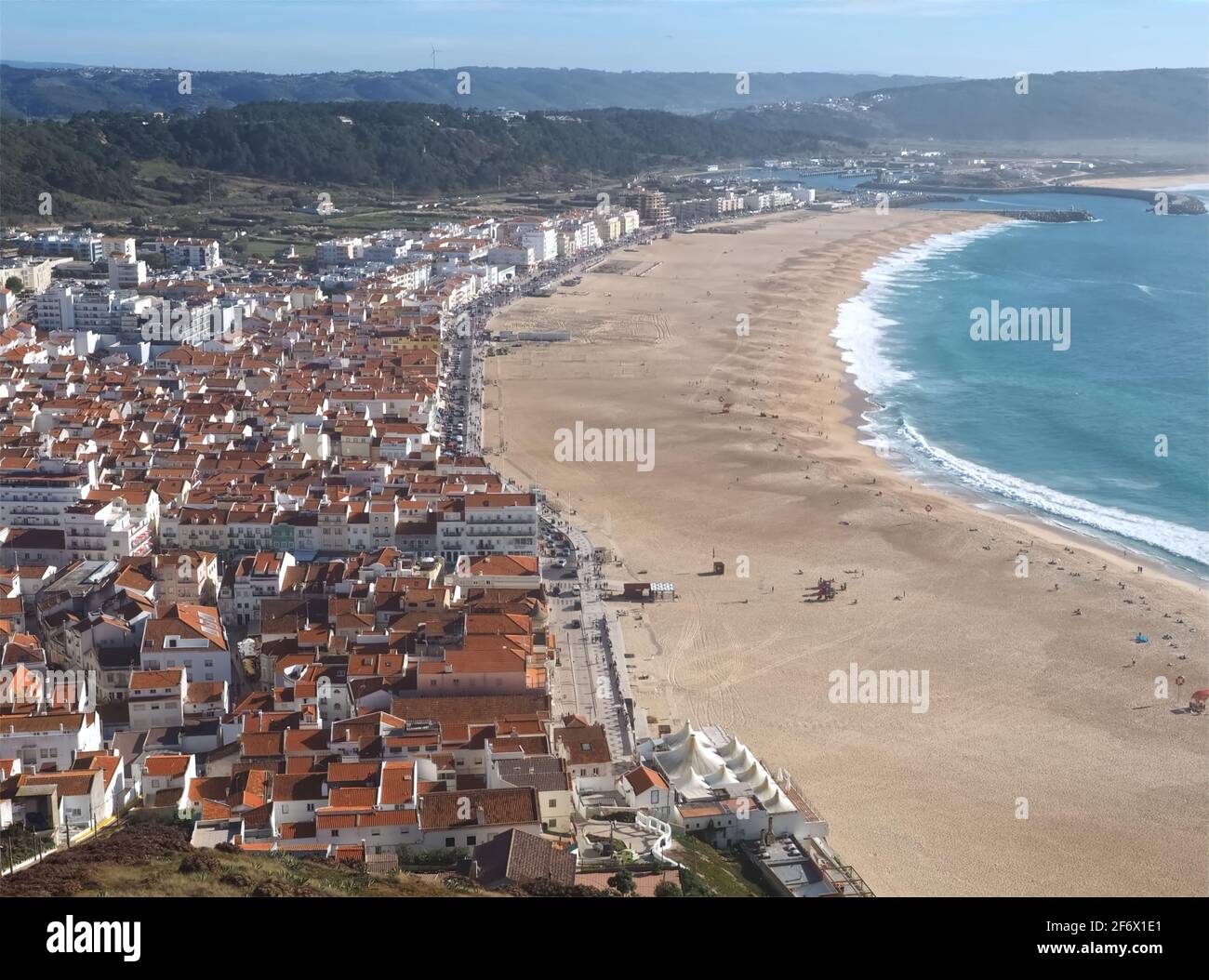 Aerial view of Nazare at the Centro coast of Portugal with long beach ...