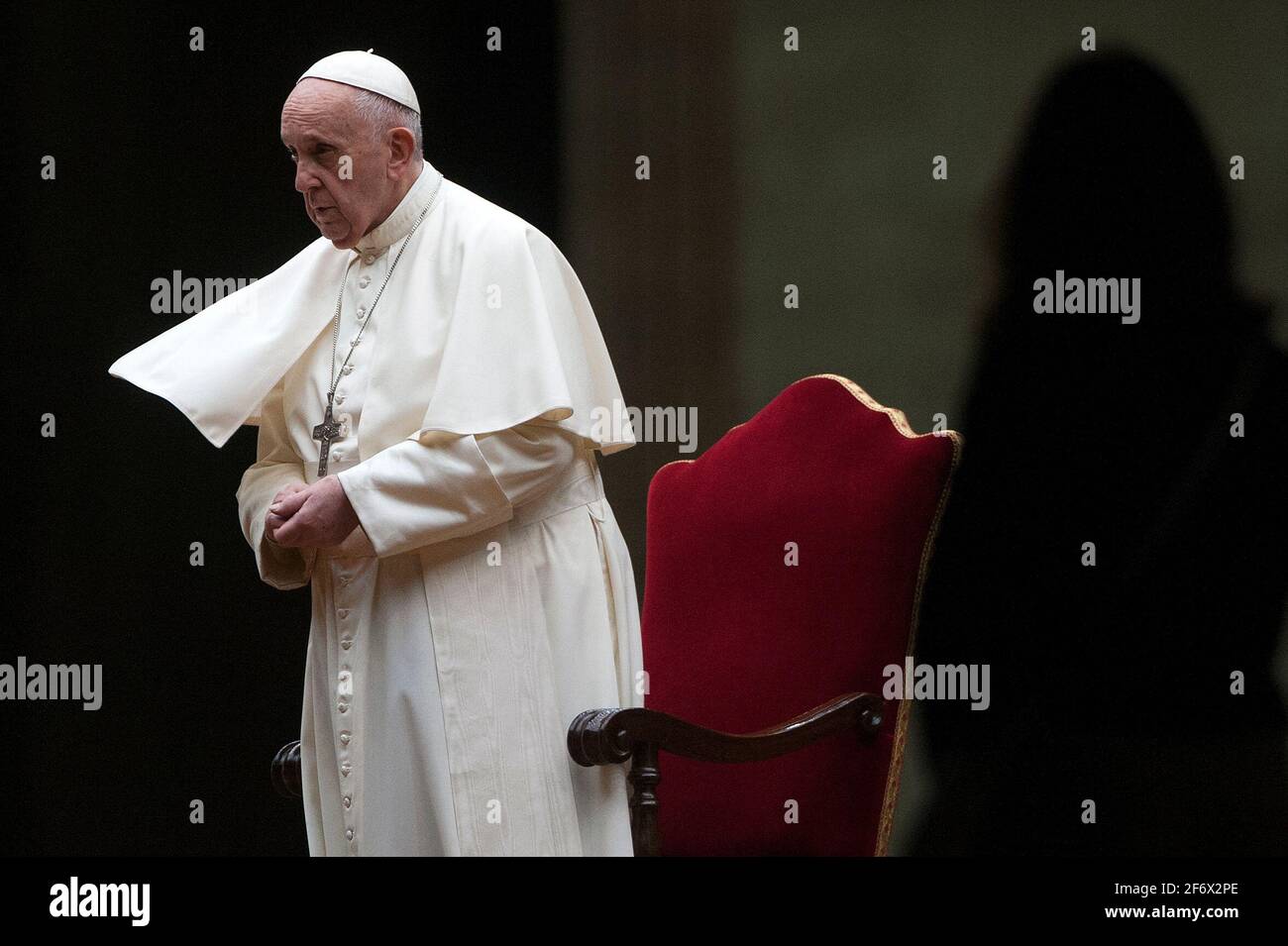 Handout photo - Pope Francis holds the Cross as he leads the ...