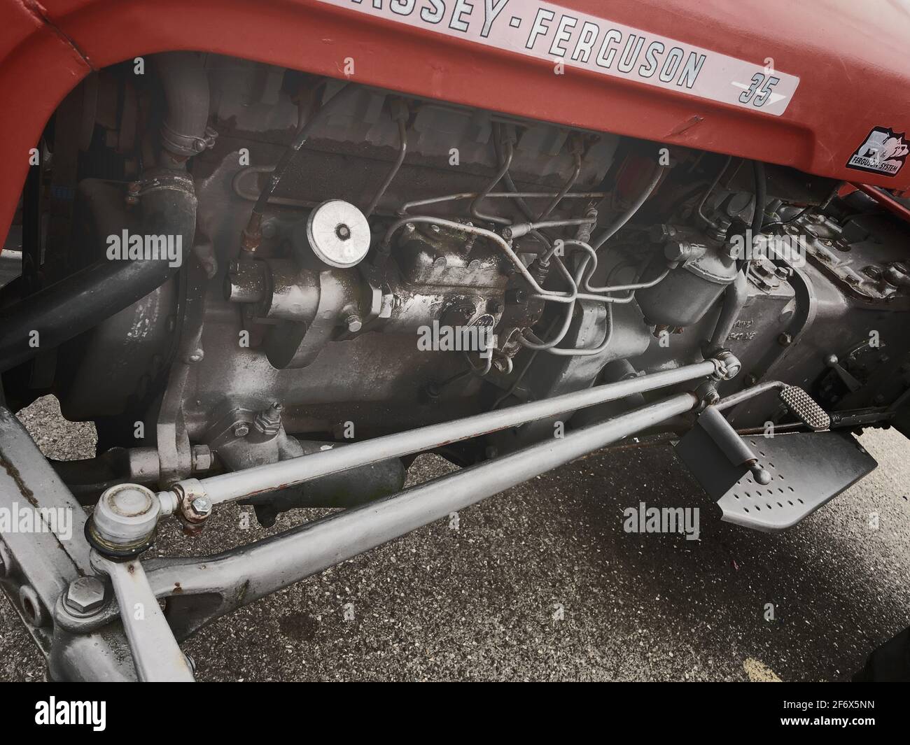 Close up engine and mechanical detail of a vintage Massey-Ferguson ...