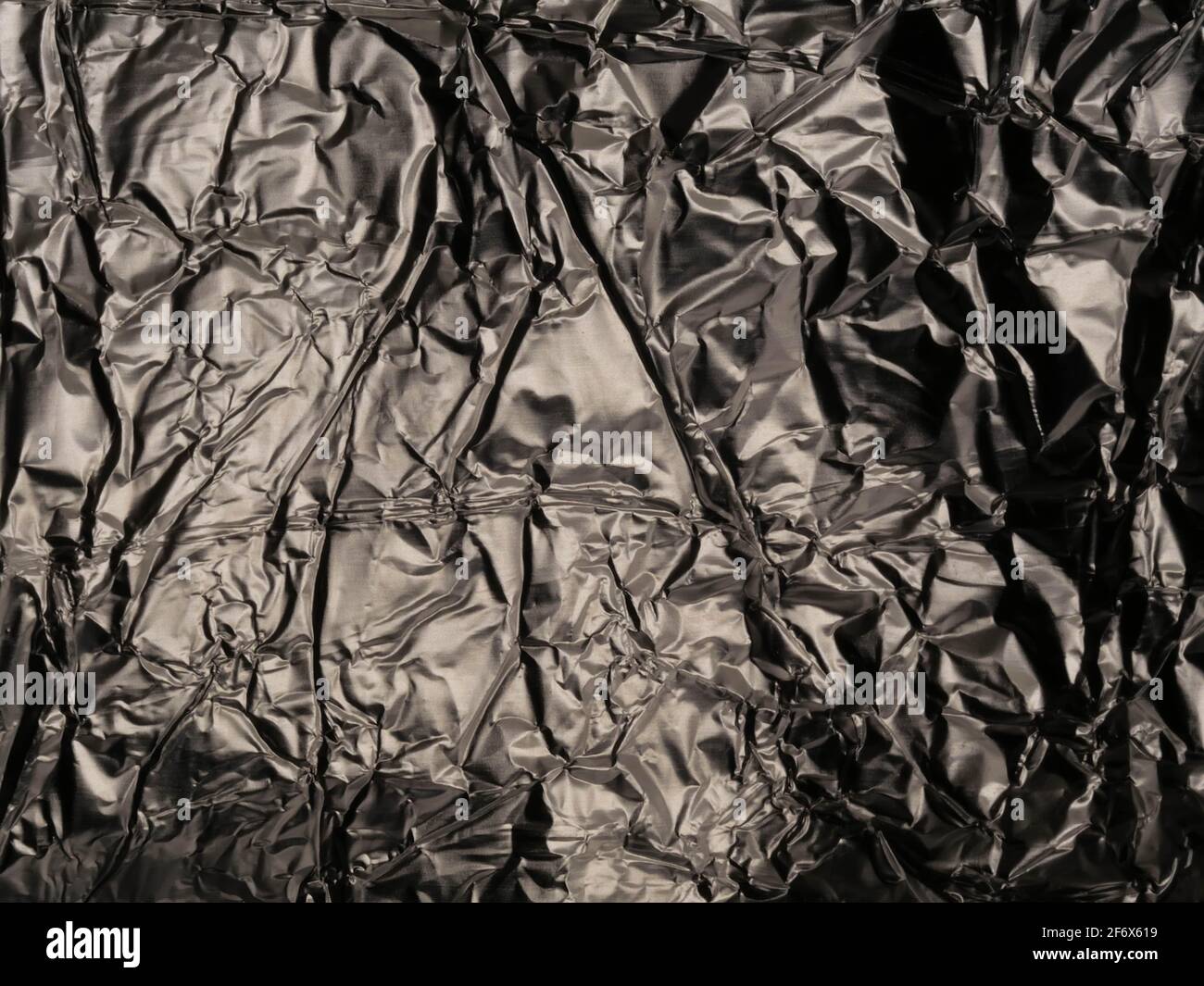 Thin sheet of silver leaf background with shiny uneven surface Stock ...