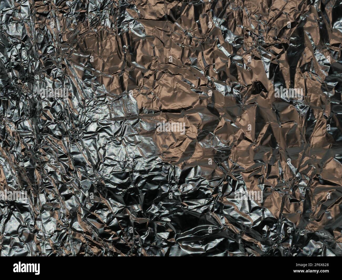 Thin sheet of silver leaf background with shiny uneven surface Stock ...