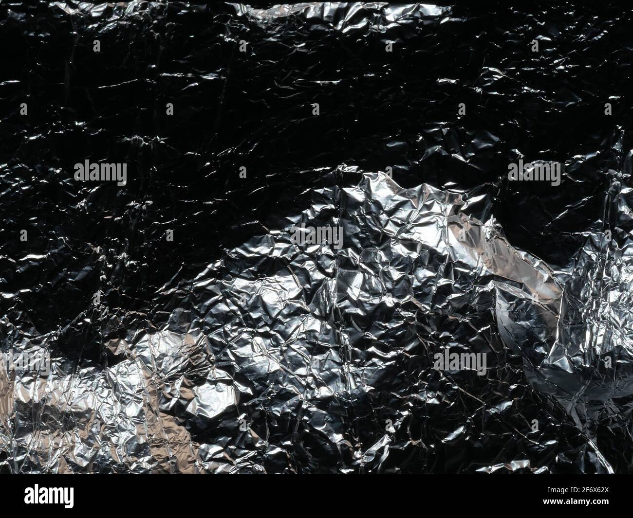 Thin sheet of silver leaf background with shiny uneven surface Stock ...