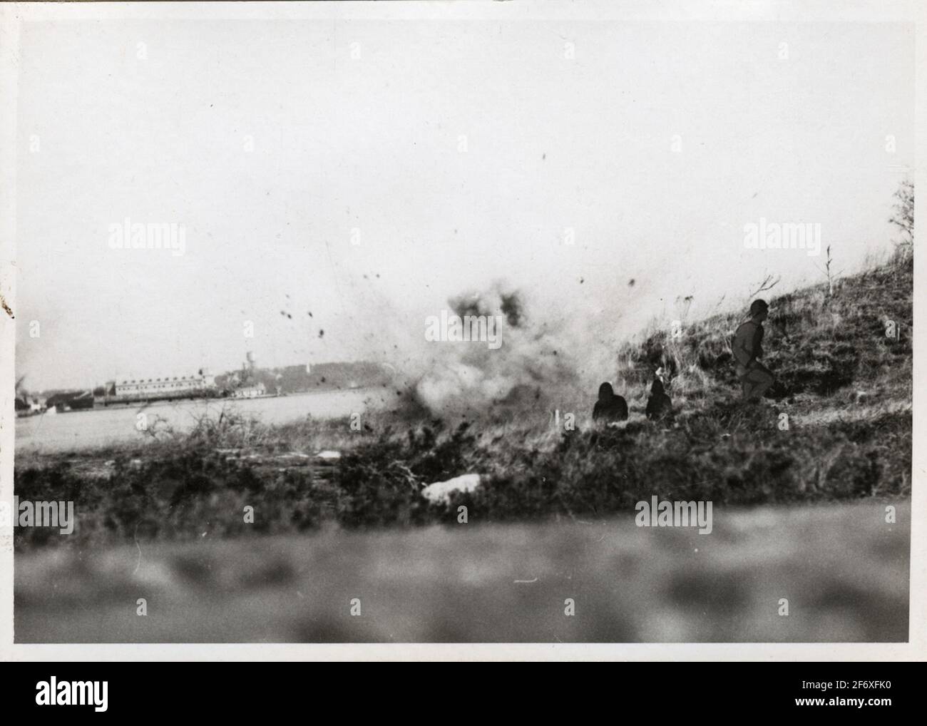 Explosion on hill men hi-res stock photography and images - Alamy