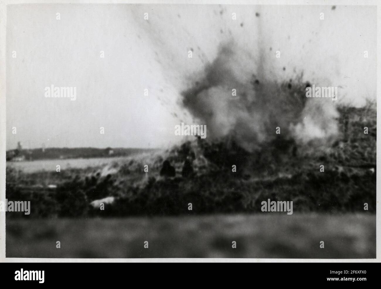 Explosion on hill Stock Photo - Alamy