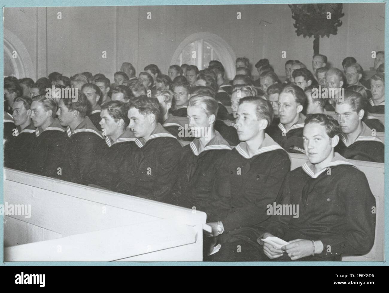 Sailors in the church Stock Photo - Alamy