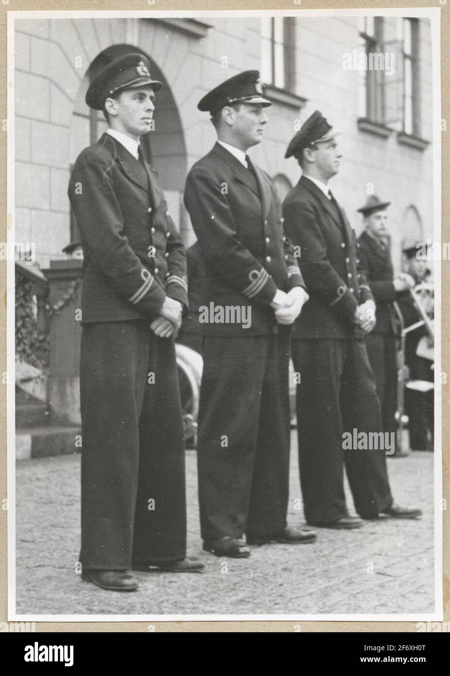 Three military people Stock Photo - Alamy