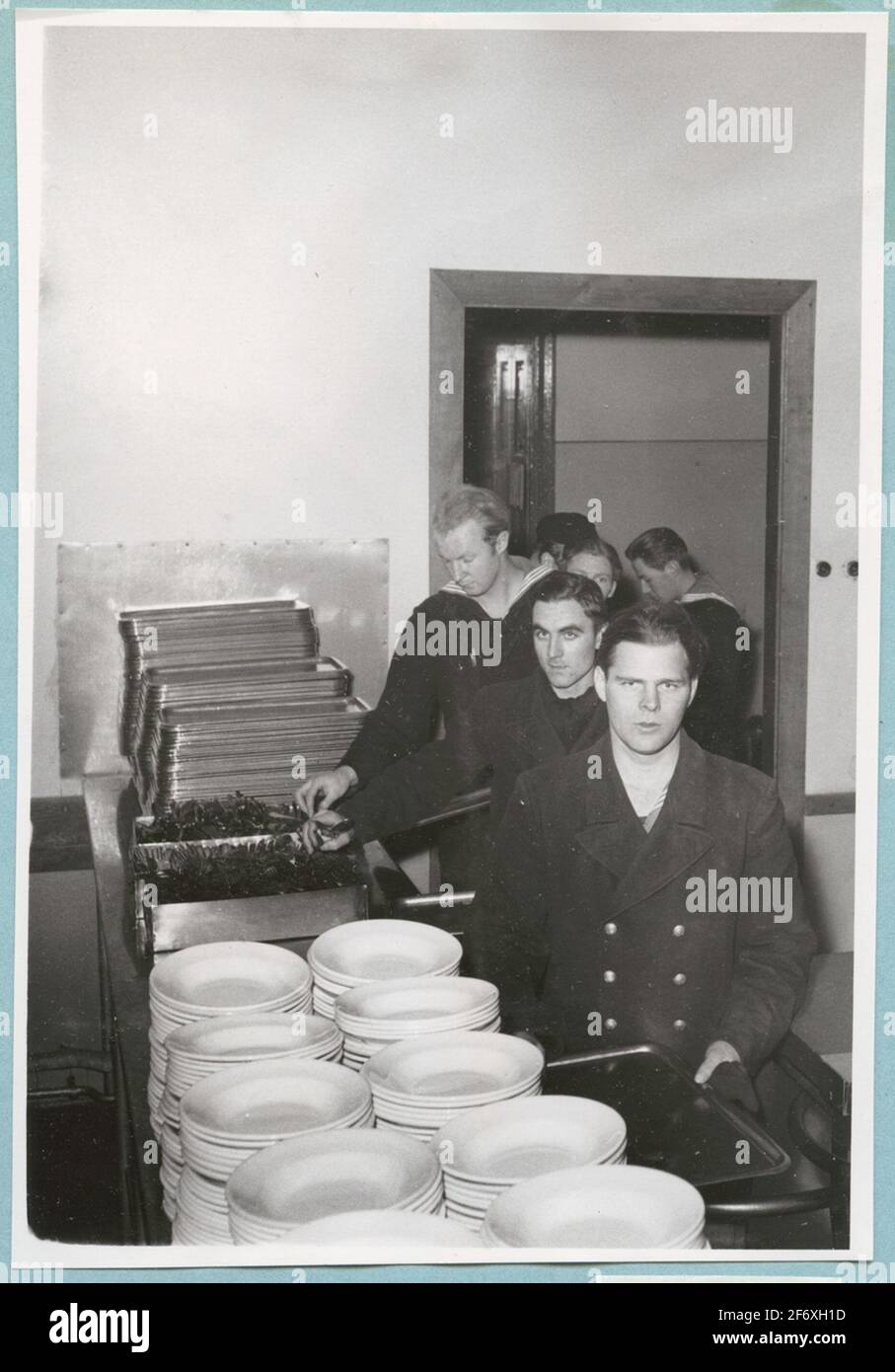 Men in queue Stock Photo - Alamy