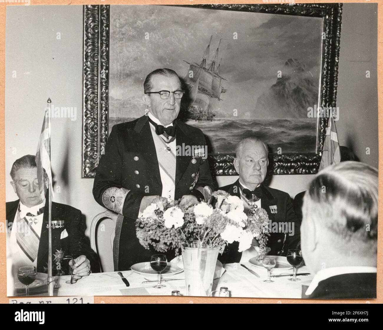 Speech at dinner table Stock Photo - Alamy