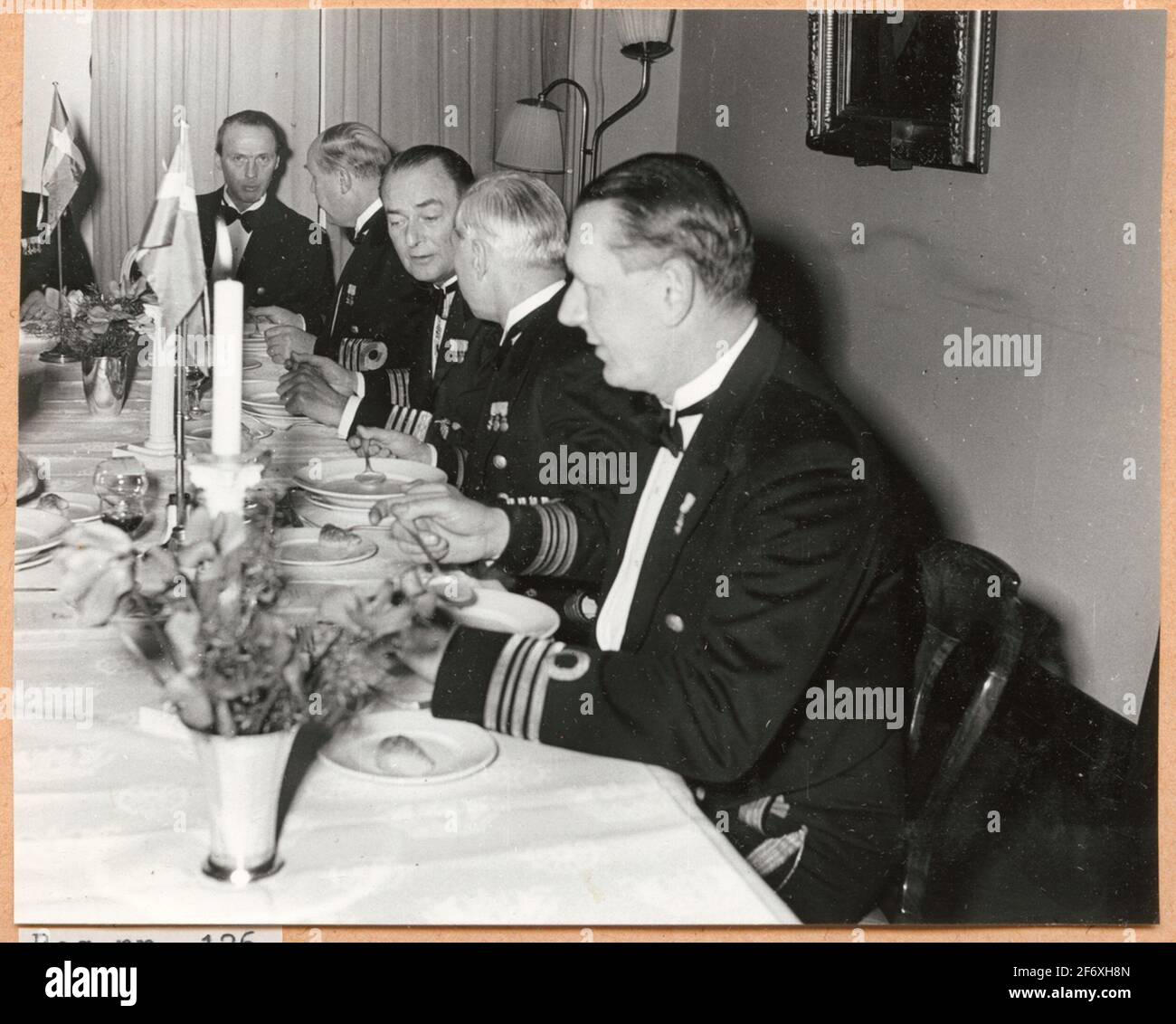 Speech at the dinner table Stock Photo - Alamy