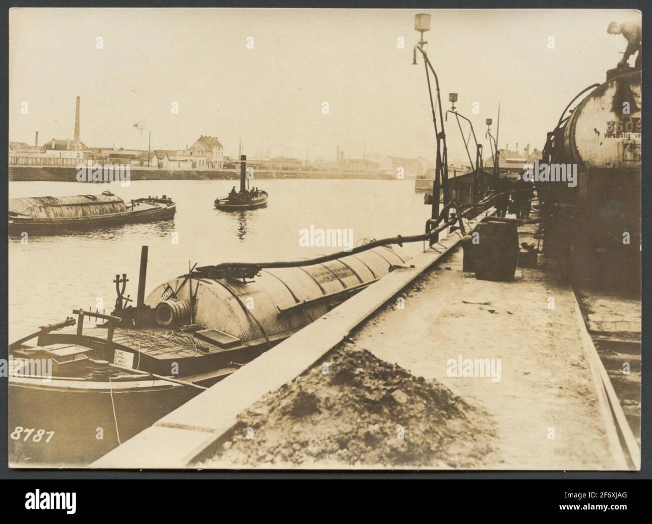 The image shows a loading cask where a tanker is loaded with gasoline ...