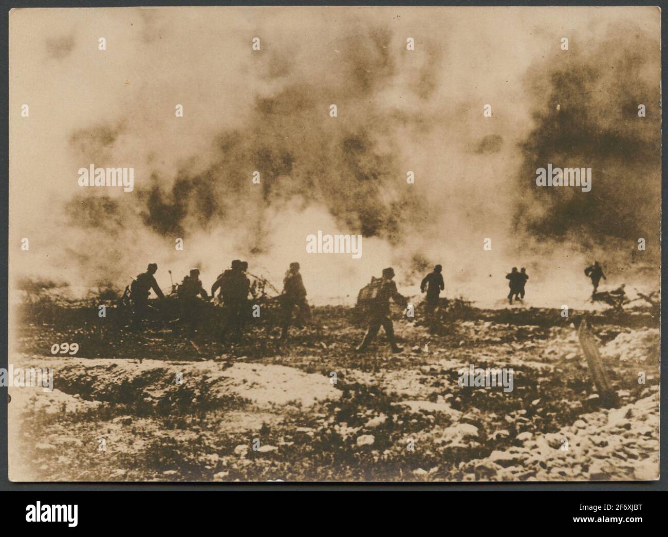 The picture shows infantry soldiers running over the battlefield during ...