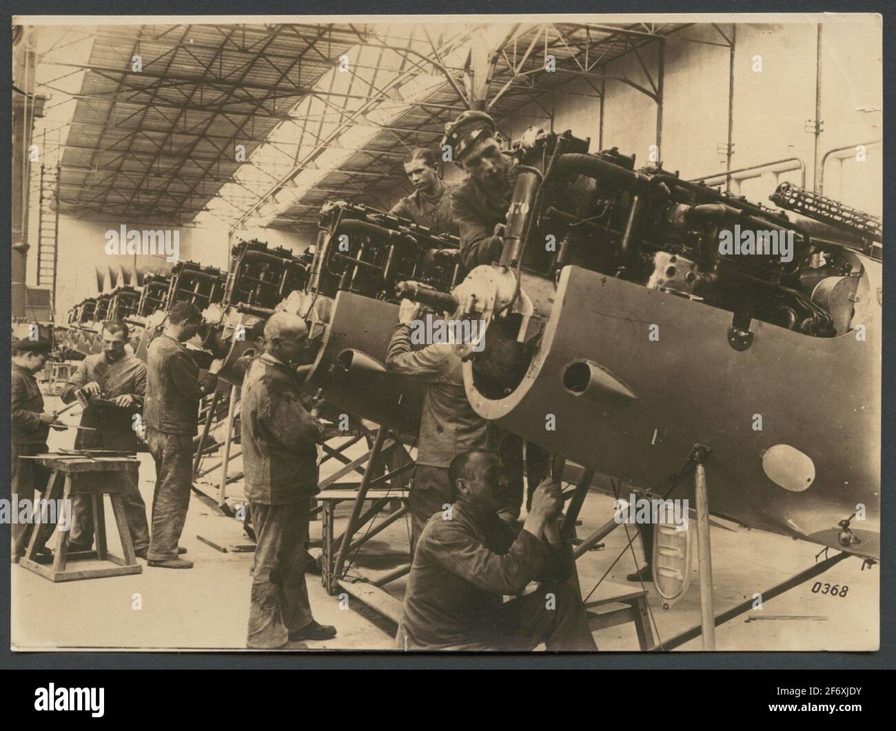 The picture shows the installation of aircraft engines in German ...