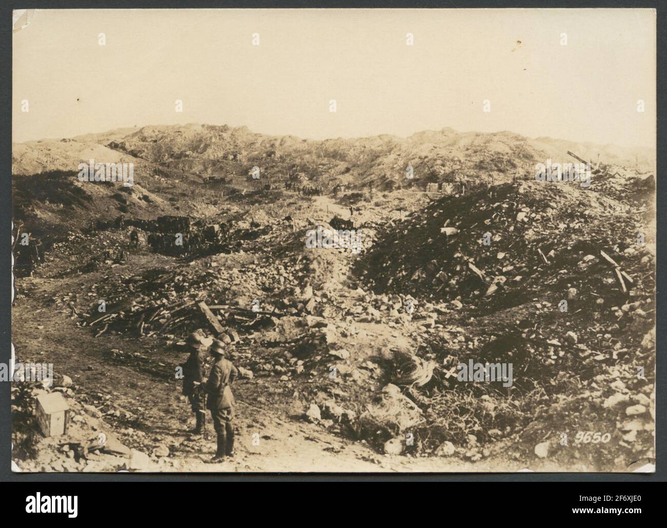 The picture shows two soldiers in the middle of the battlefield on ...