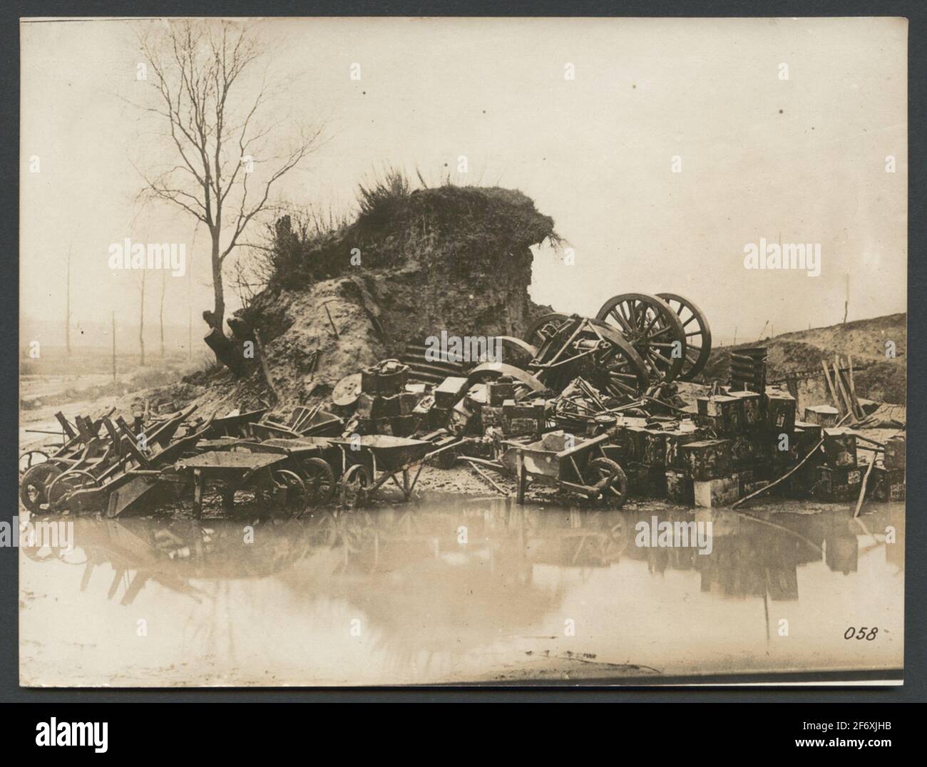 The picture shows a high military equipment in front of a soil.The pile ...