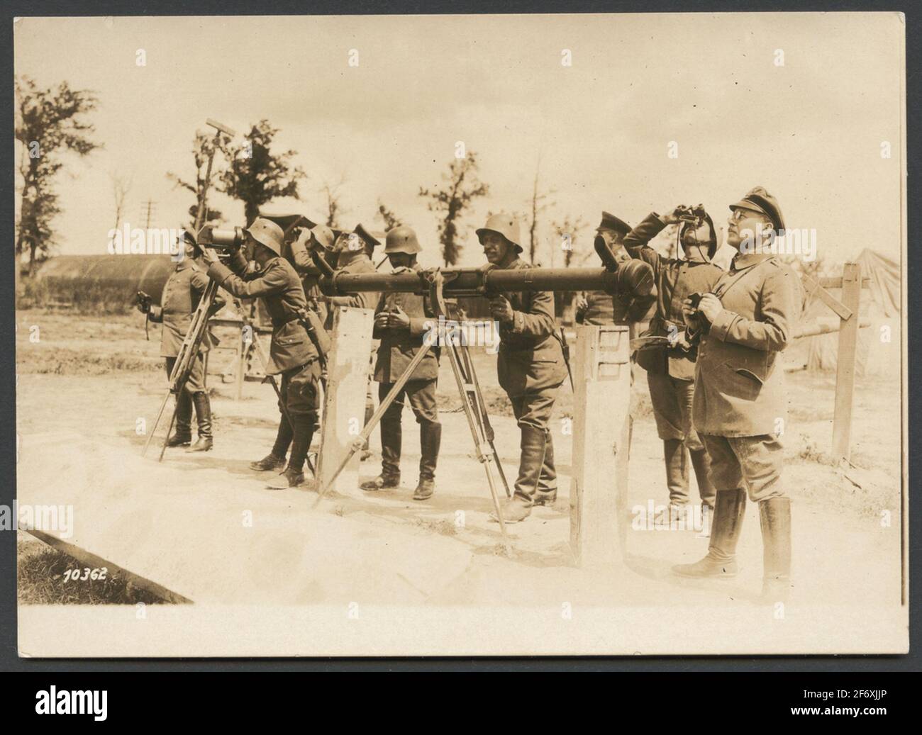 The picture shows a group of soldiers who work with a measuring ...