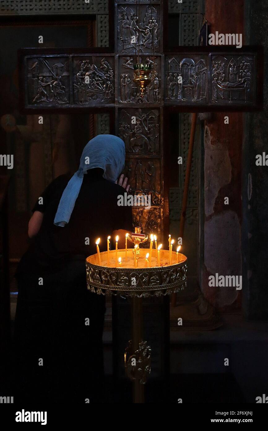 old woman praying in orthodox church, georgia Stock Photo - Alamy