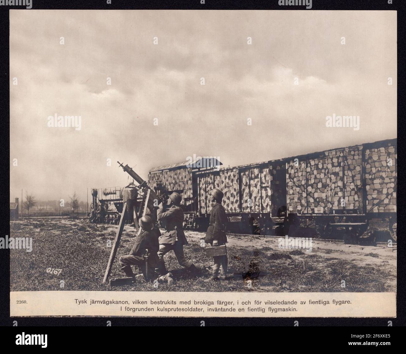 The picture shows three soldiers at a machine gun.A soldier aimed with ...