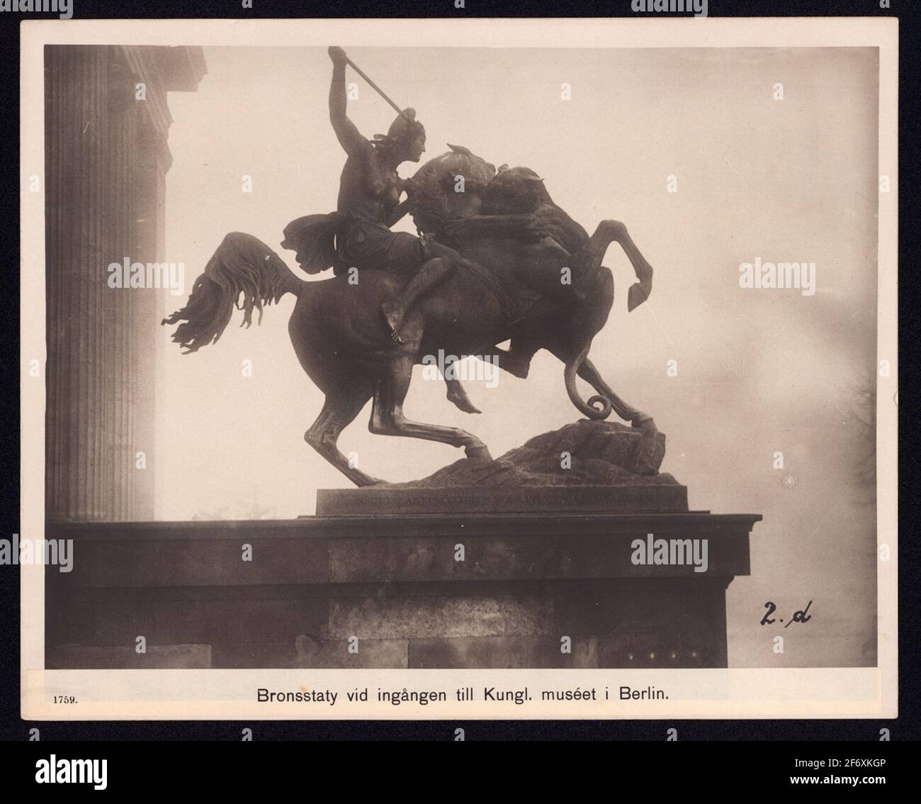 The picture shows a bronze sculpture that adorns the free staircase of ...