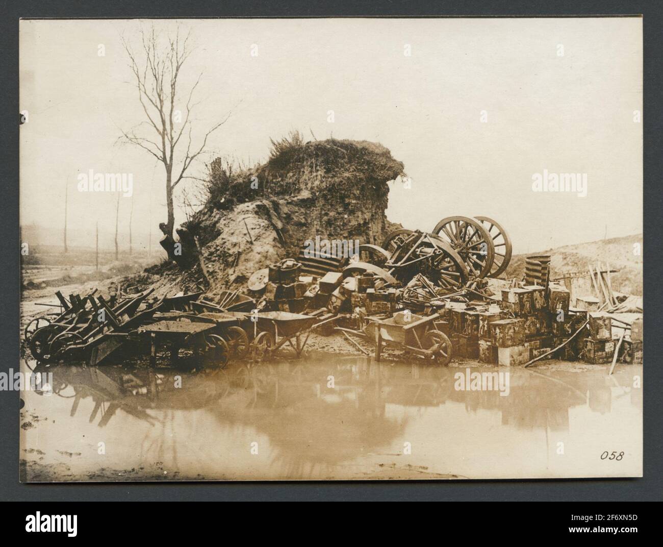 The picture shows a high military equipment in front of a soil.The pile ...