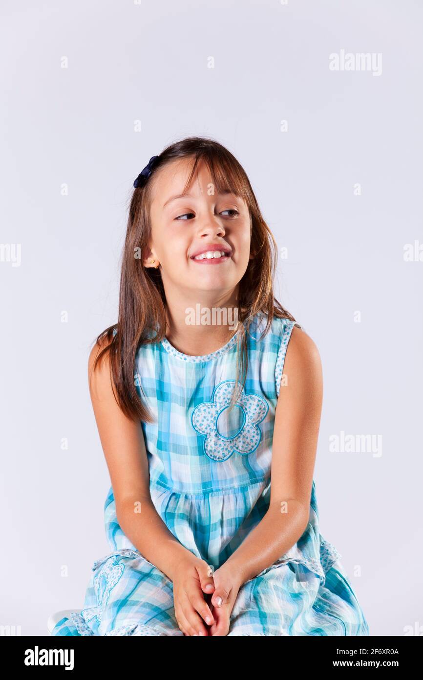 Happy little girl portrait (isolated on gray Stock Photo - Alamy