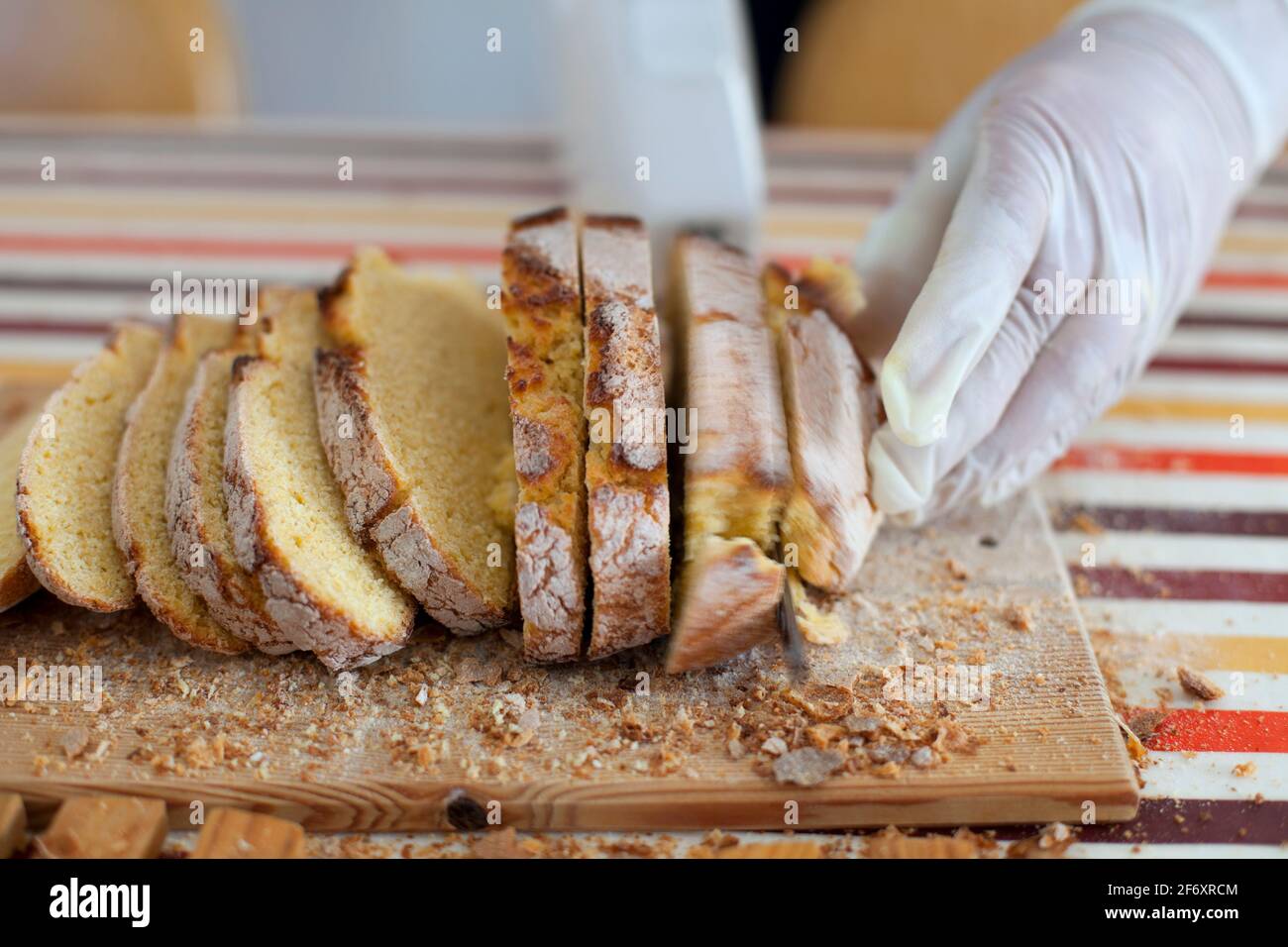 Cutting fresh bread Stock Photo - Alamy