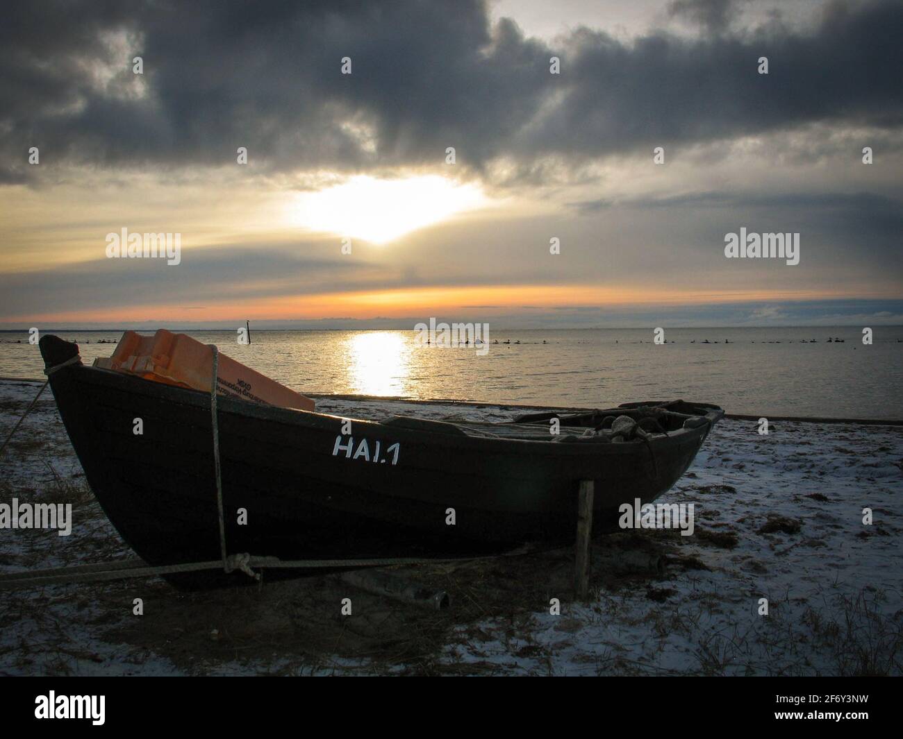 Beached shark (German: Hai): a traditional wooden fisherboat under a ...