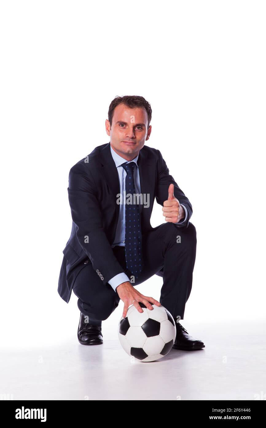Sport football manager holding ball hi-res stock photography and images ...