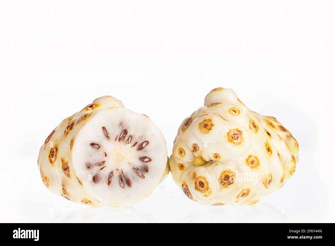 Raw noni fruit Cut Out Stock Images & Pictures - Alamy