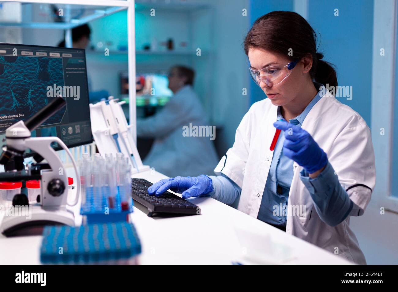 Professional doctor scientist holding vacutainer blood sample for ...