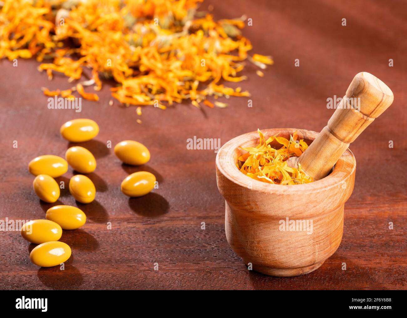 Calendula capsules. Alternative Medicine - Calendula officinalis Stock ...