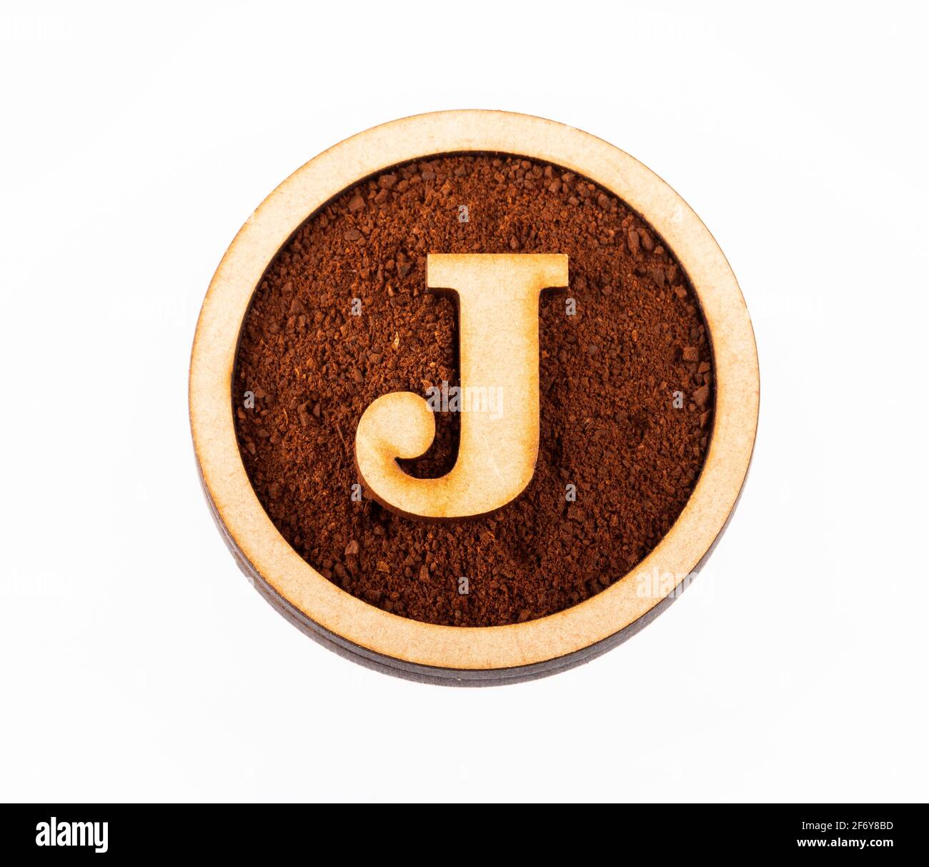 J, wooden alphabet letter - Ground organic coffee. Coffea Stock Photo ...