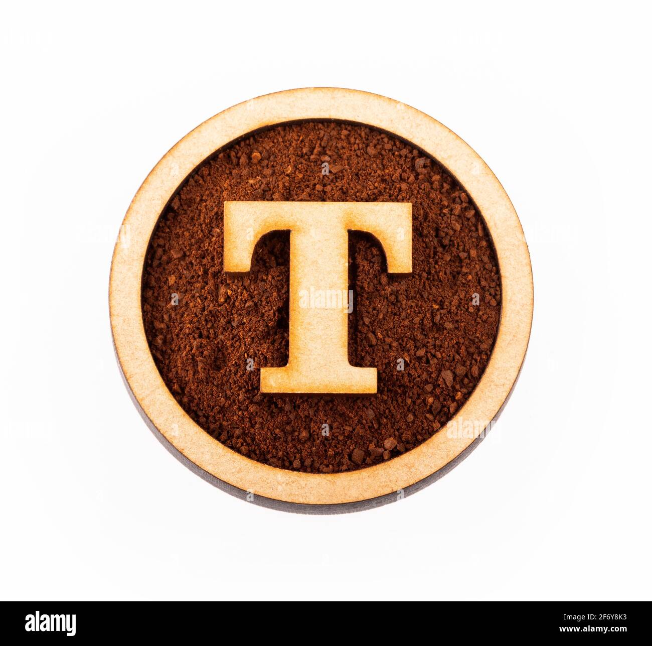 T, wooden alphabet letter - Ground organic coffee. Coffea Stock Photo ...