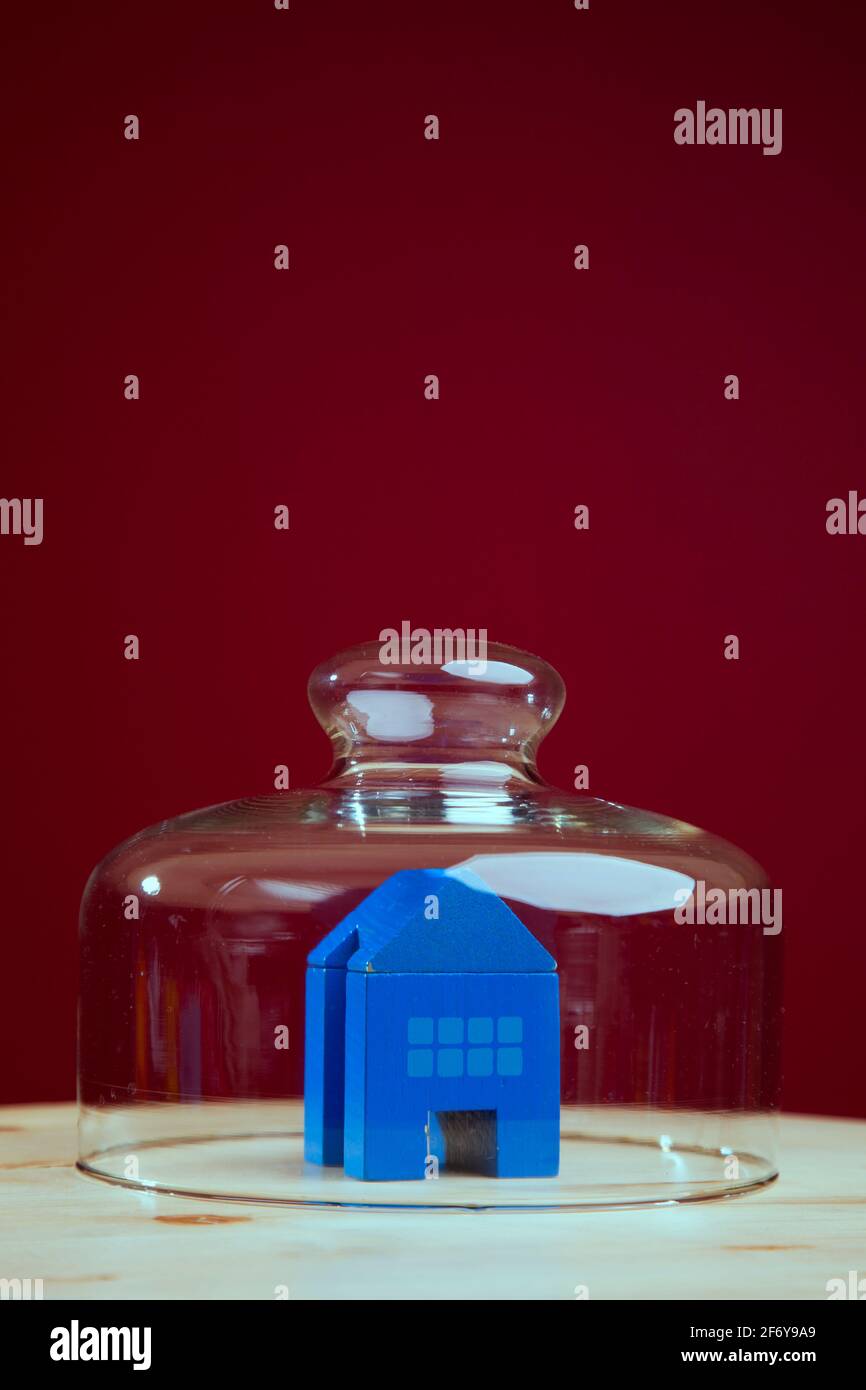 House protected inside a glass shield Stock Photo - Alamy