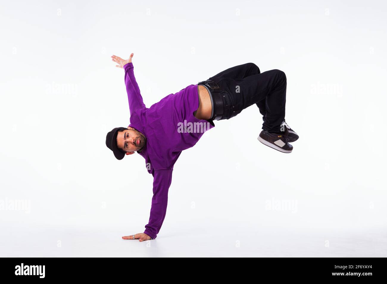 hip hop dancer performing move isolated over white background Stock ...