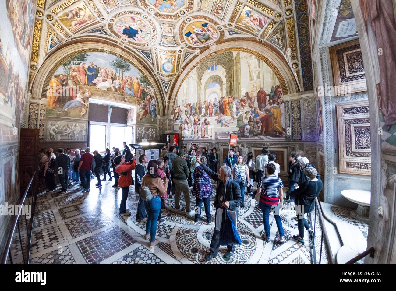 Vatican - Oct 06, 2018: Tourists enjoy painting in Raphael Stanzas ...