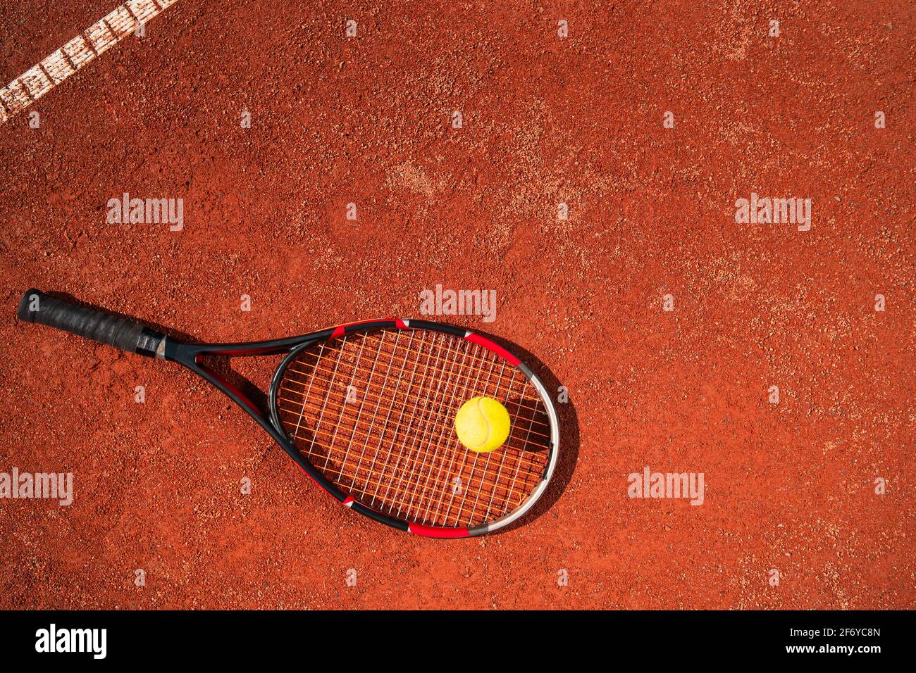 Top view of tennis racket with ball who lying on the surface of the ...