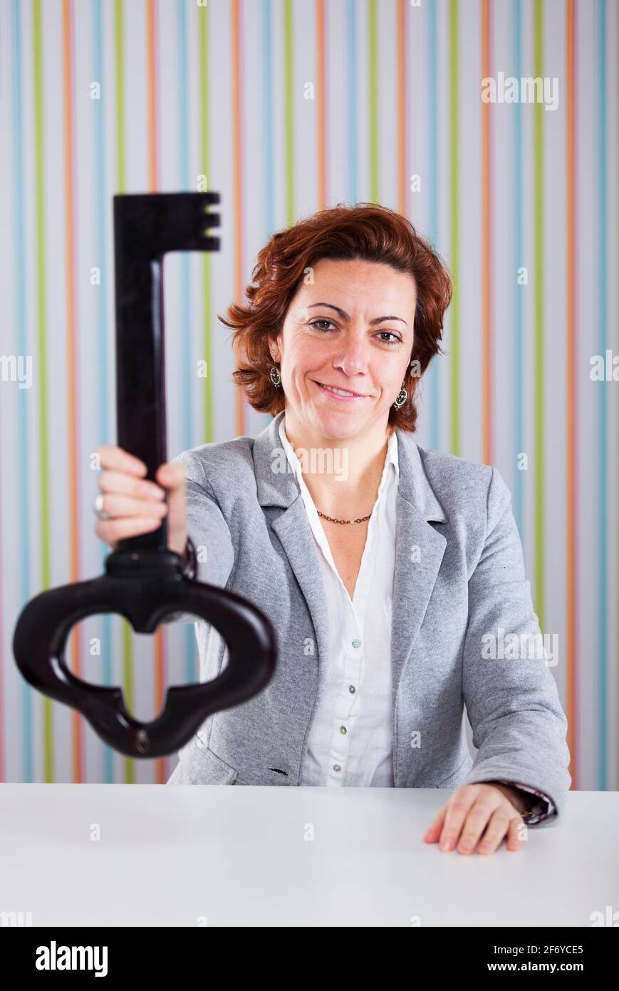 Beautiful woman holding giant hi-res stock photography and images - Alamy