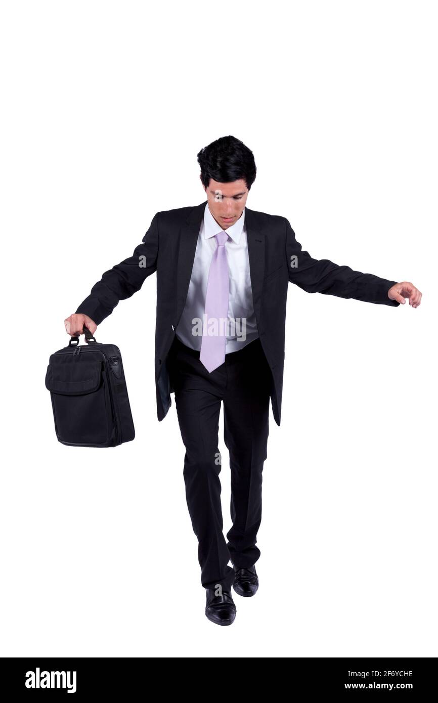 Businessman with slow walking with fear from falling (isolated on white ...