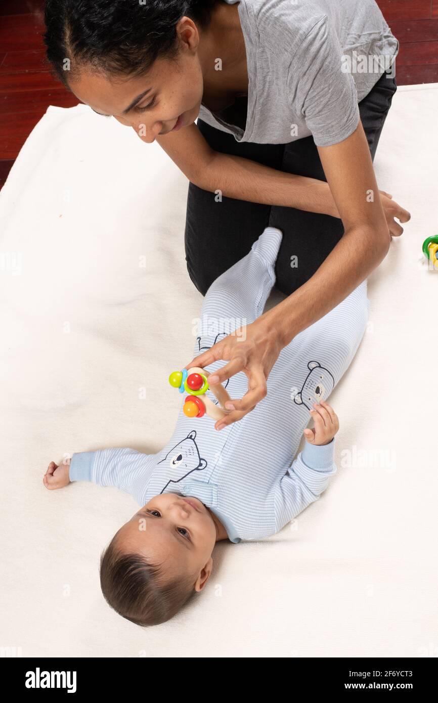 Baby look at mother hi-res stock photography and images - Alamy