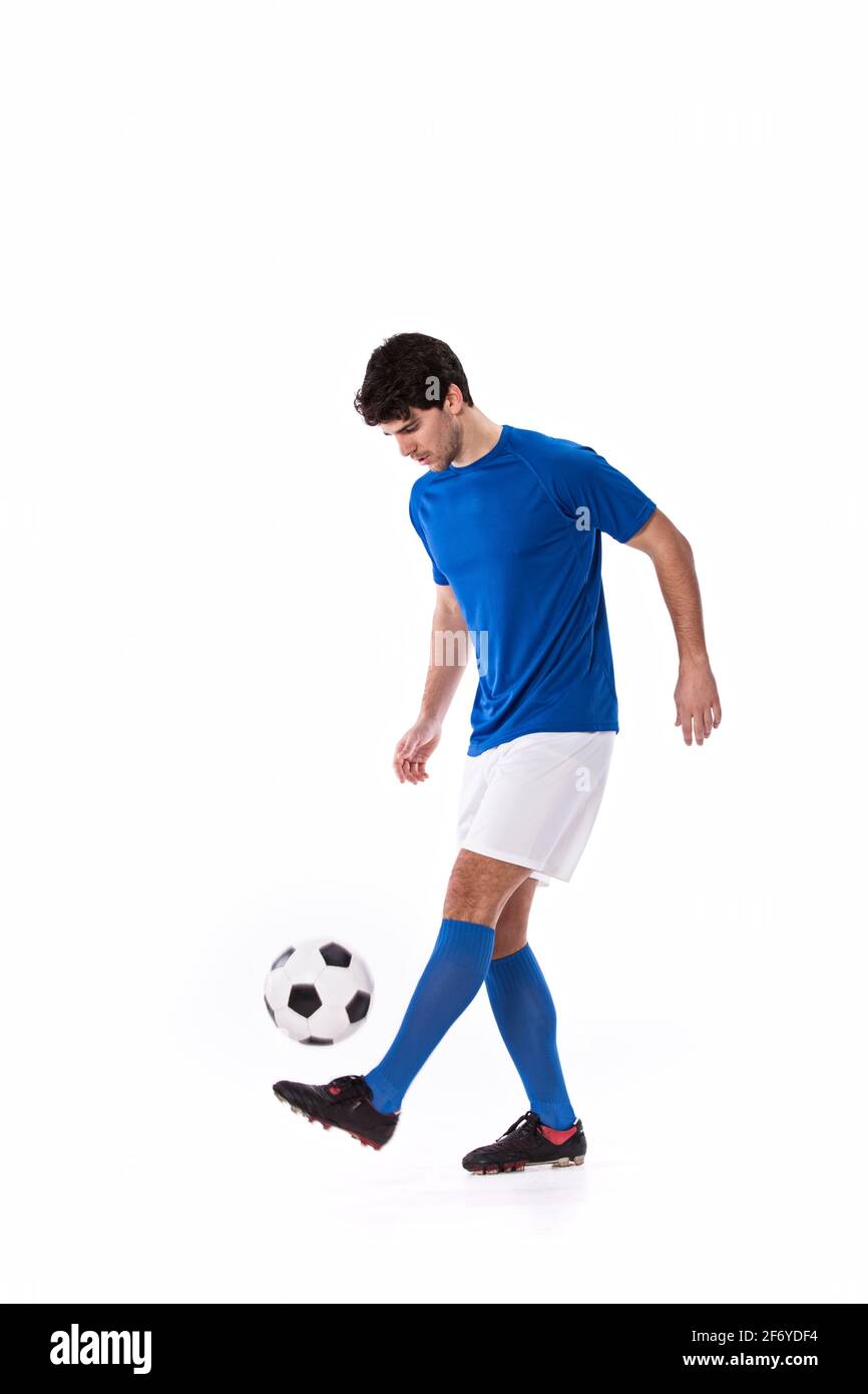 Soccer player with a soccer ball Stock Photo - Alamy