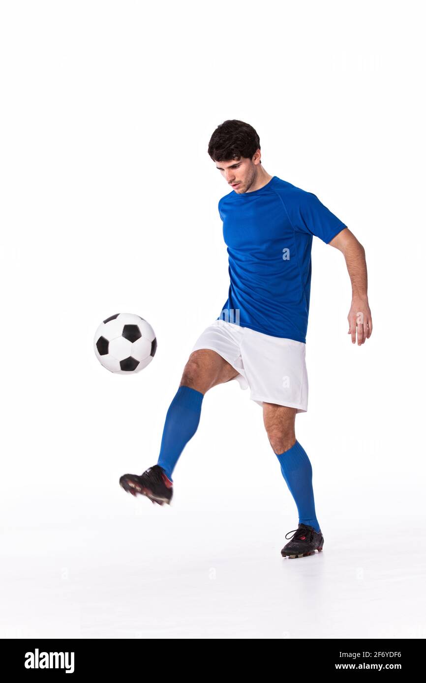Soccer player with a soccer ball Stock Photo - Alamy
