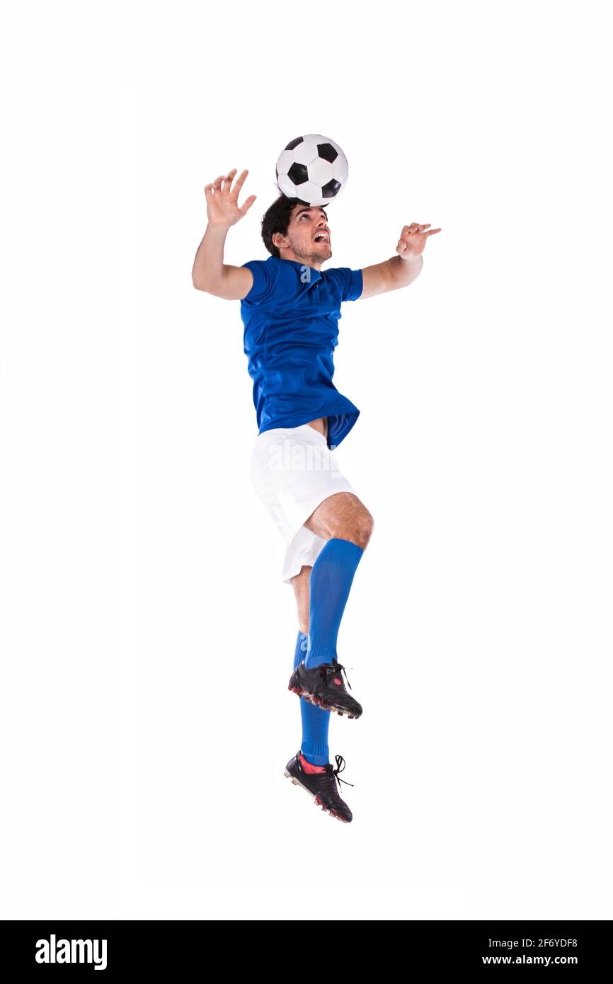 Soccer player with a soccer ball Stock Photo - Alamy