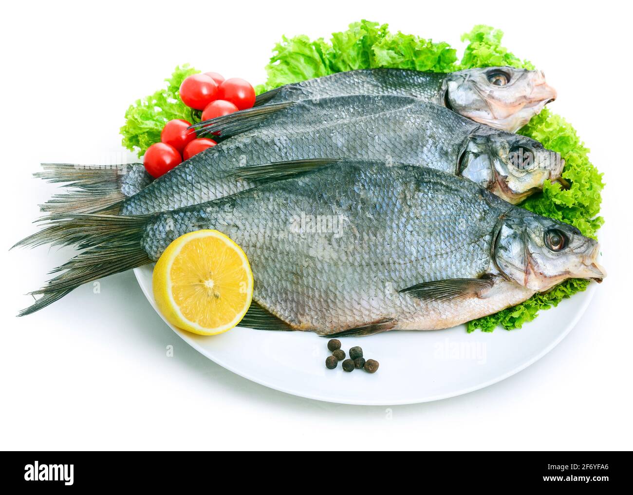 Group of dried fish at plate . Seafood Stock Photo - Alamy