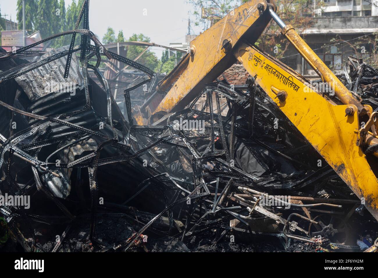 Mumbai , India - 30 March 2021, Burnt rubble and twisted metal from ...