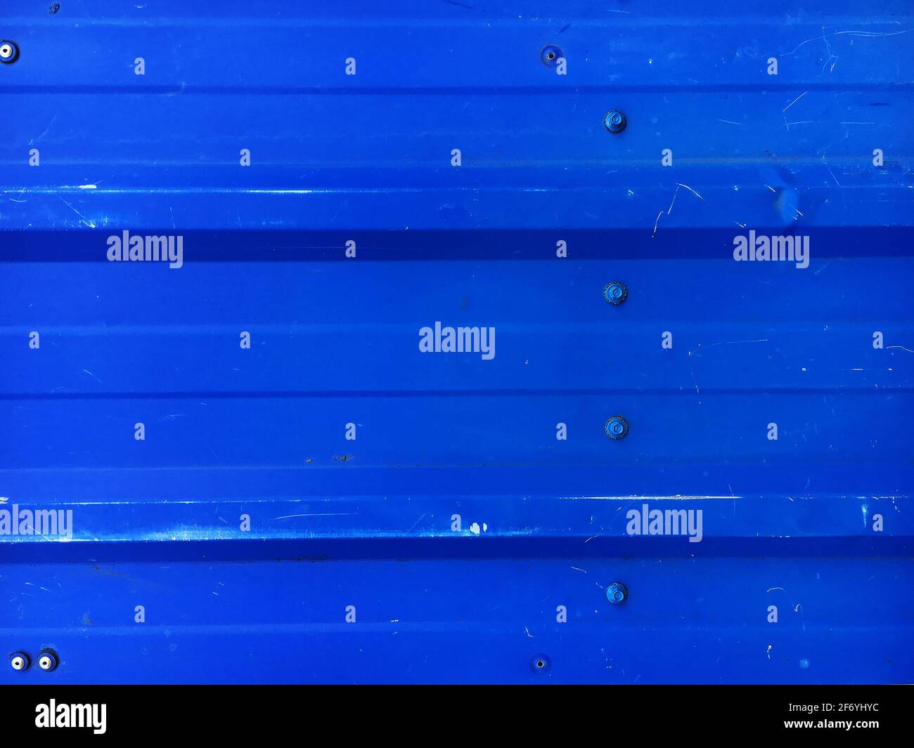 Blue rippled metal texture with bolts and rivets Stock Photo - Alamy
