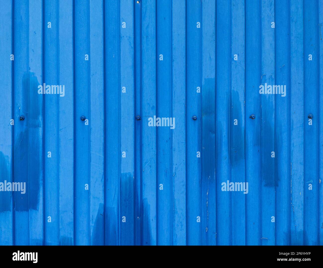 Blue rippled metal texture with bolts and rivets Stock Photo - Alamy