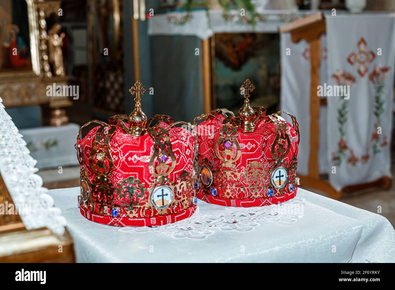 Traditional wedding crowns in a church. Wedding crown in church ready ...
