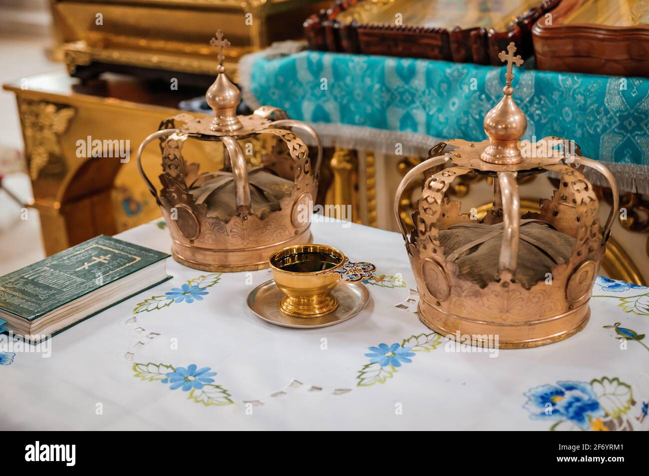 Traditional wedding crowns in a church. Wedding crown in church ready ...