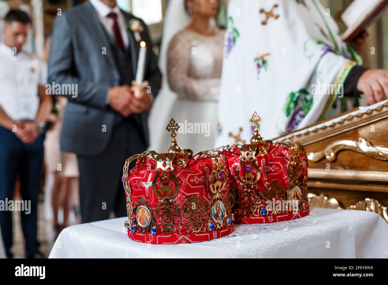 Traditional wedding crowns in a church. Wedding crown in church ready ...